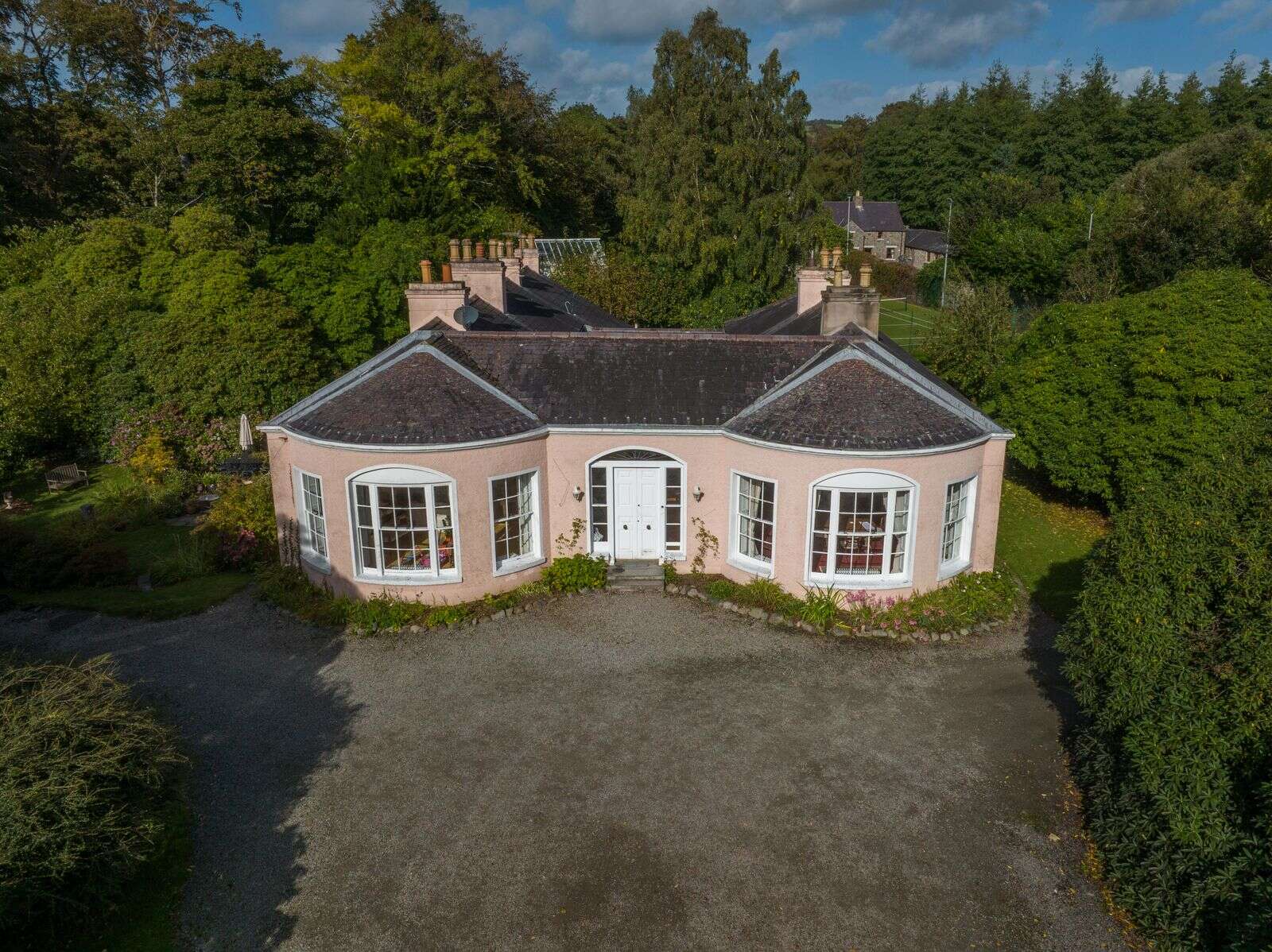 Carefully preserved listed Regency villa in woodland garden setting ...